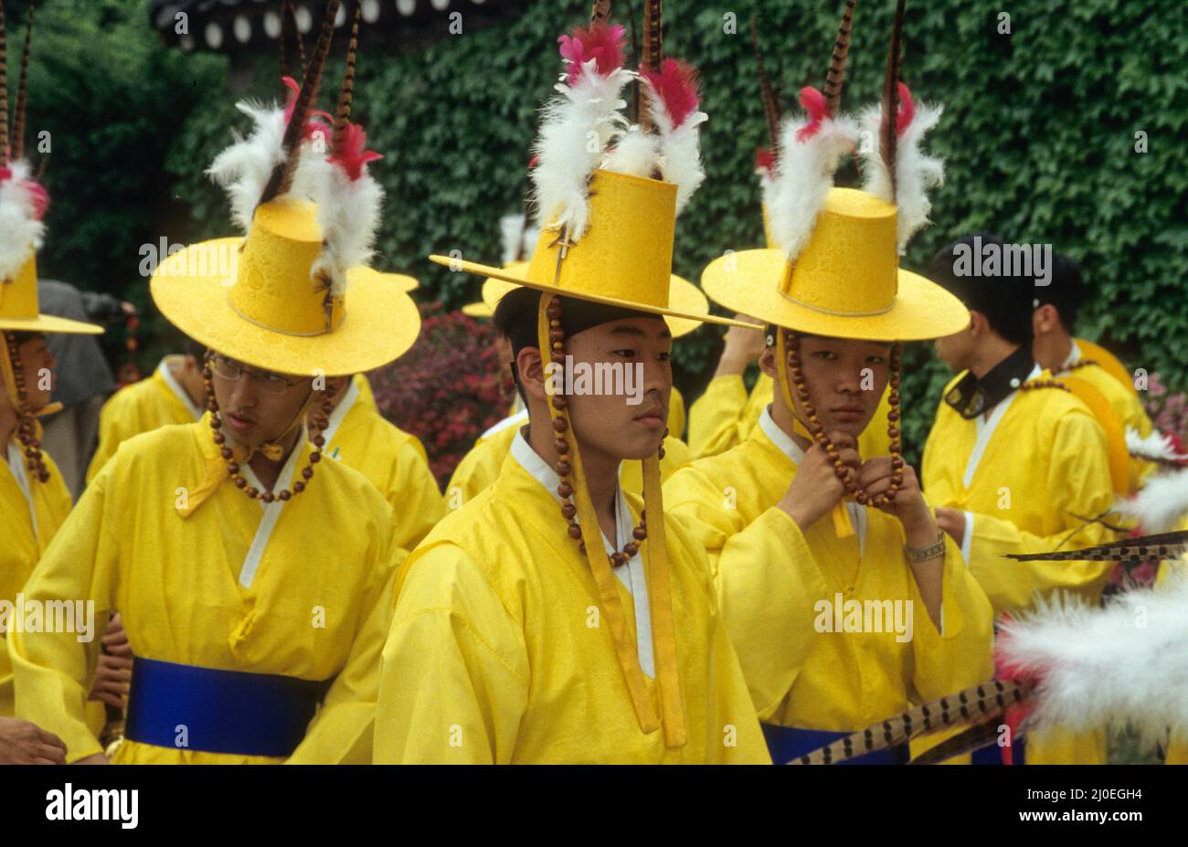 Actors dressed as guards and court officials prepare for their ...