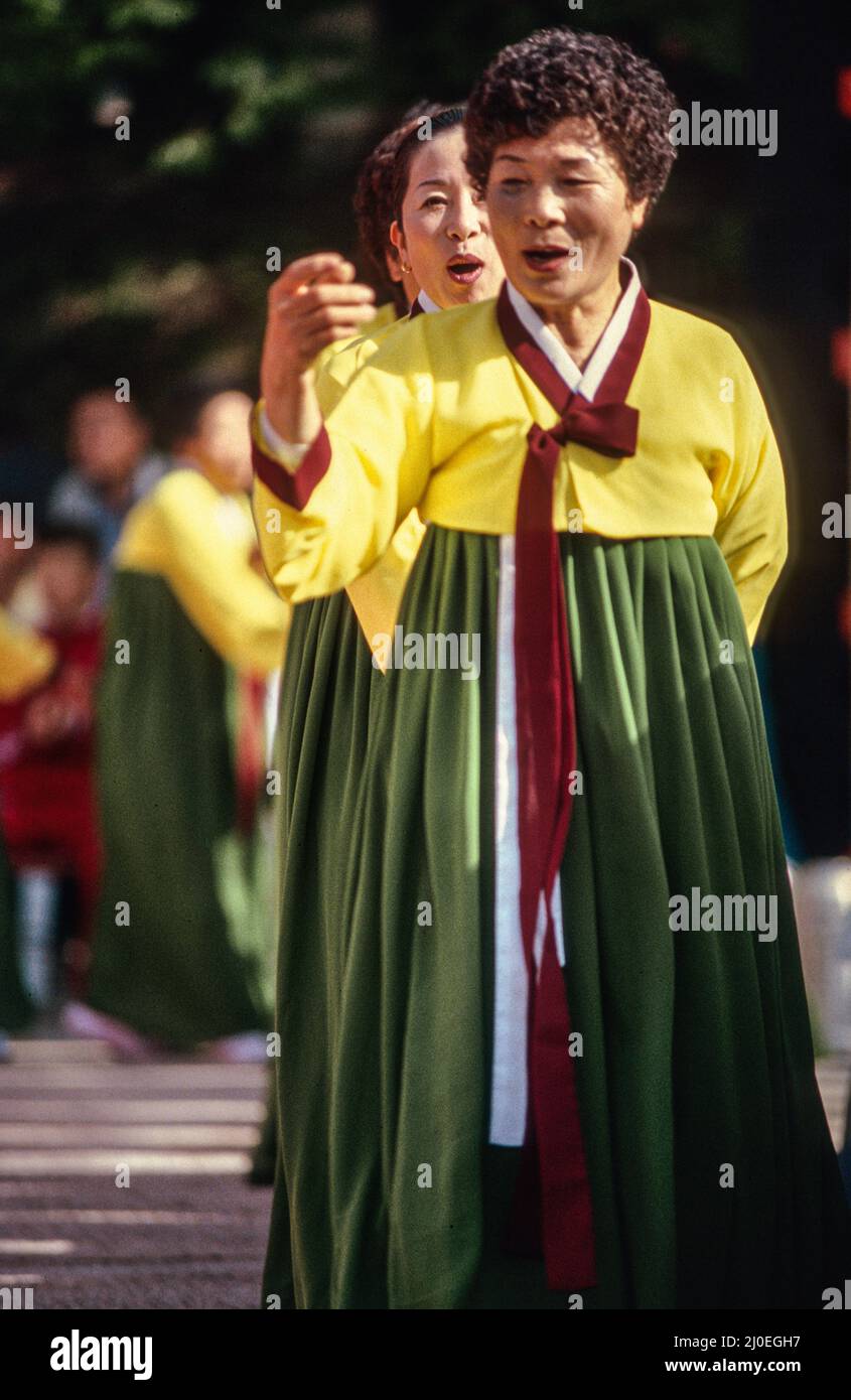 Women in traditional Hanbok dress performing a folk-dance at Damyang ...