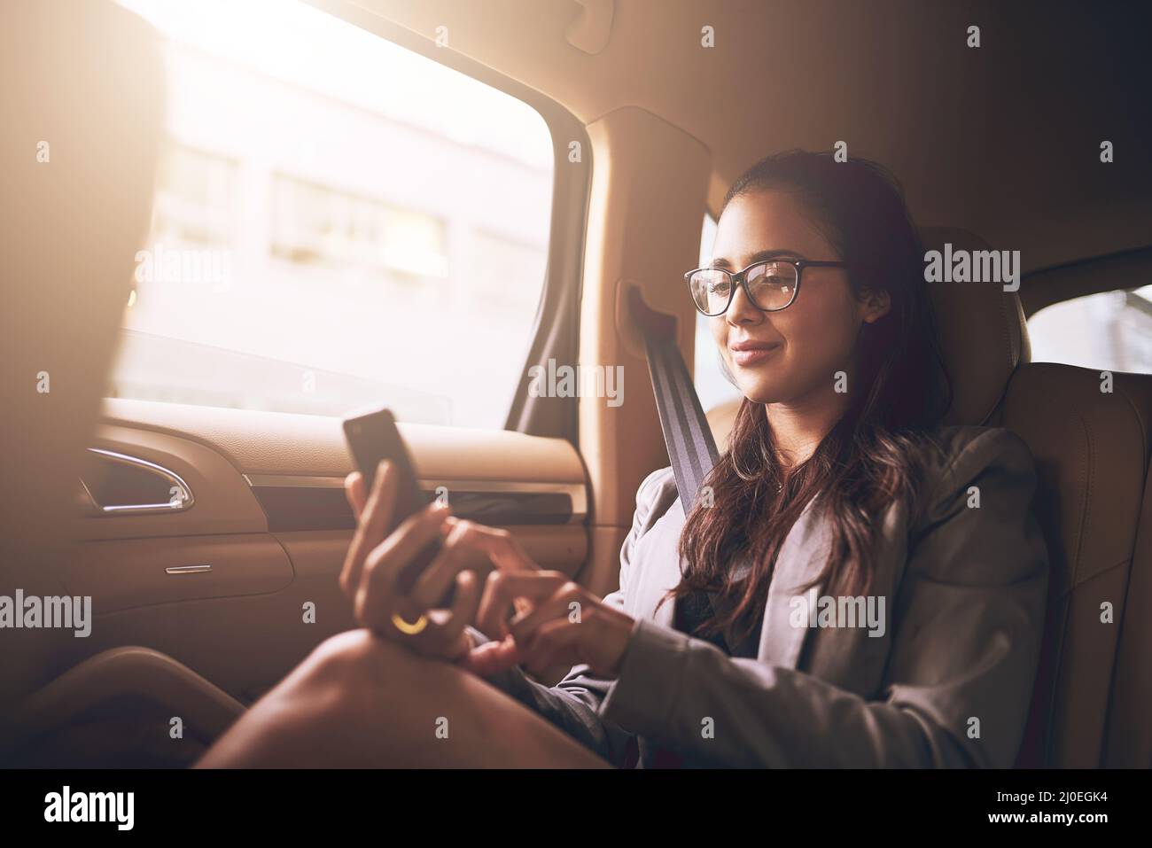 Confirming her important meetings for the day. Shot of a young ...