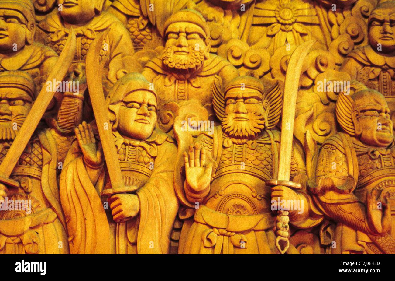Carved wooden figures in the altar room of Naksansa Buddhist temple ...