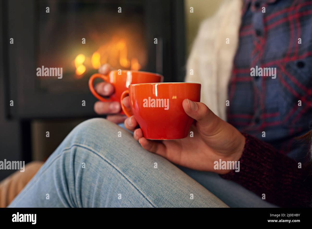 Woman drinking hot chocolate fire hi-res stock photography and images ...