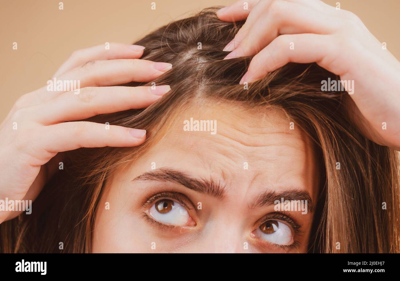 Woman scalp worried hi-res stock photography and images - Alamy