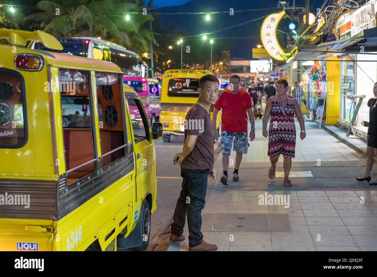 Thawewong Road in Patong by night. This road along Patong beach is very ...