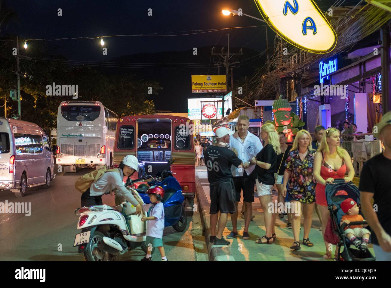 Thawewong Road in Patong by night. This road along Patong beach is very ...