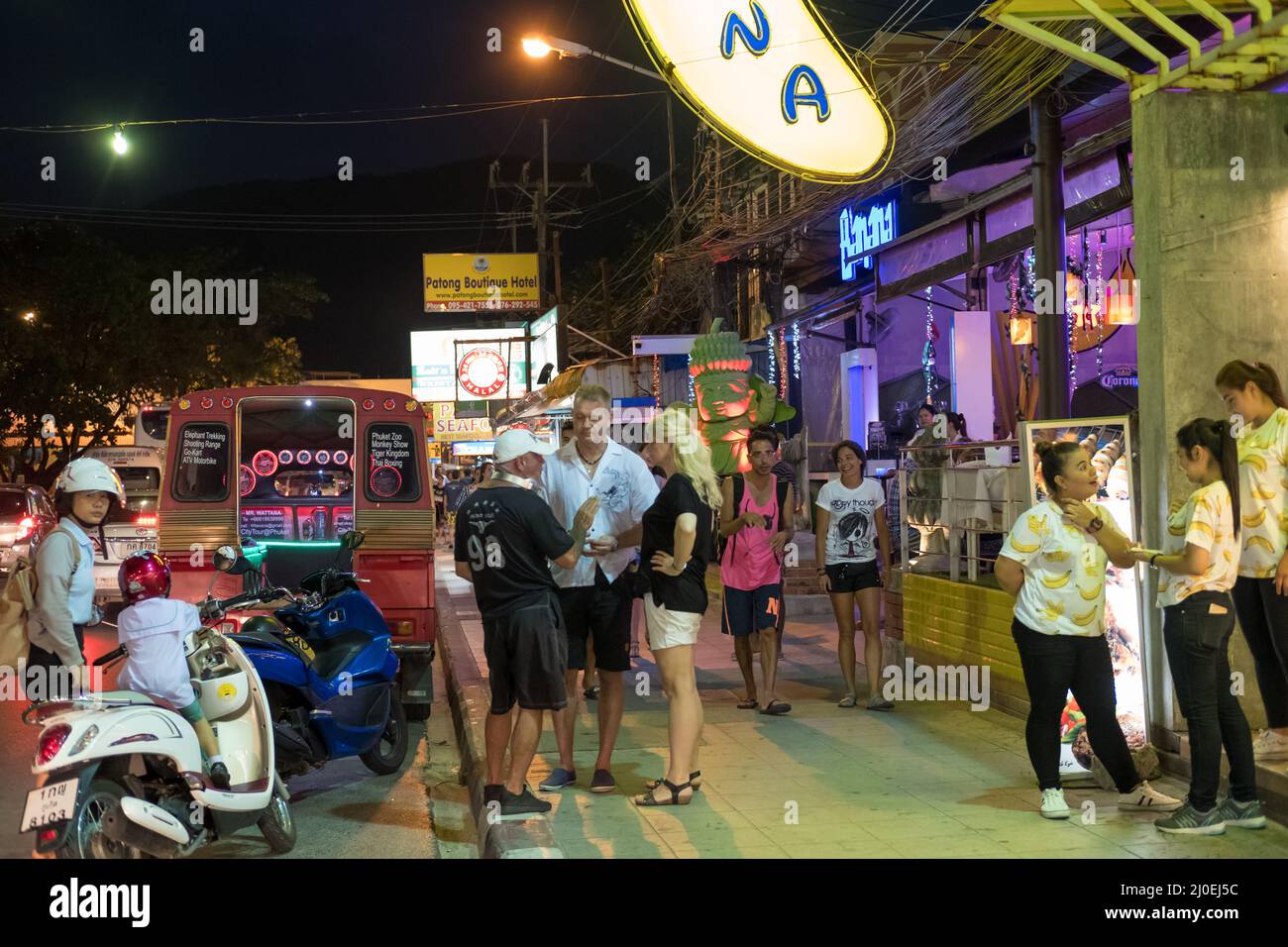Thawewong Road in Patong by night. This road along Patong beach is very ...