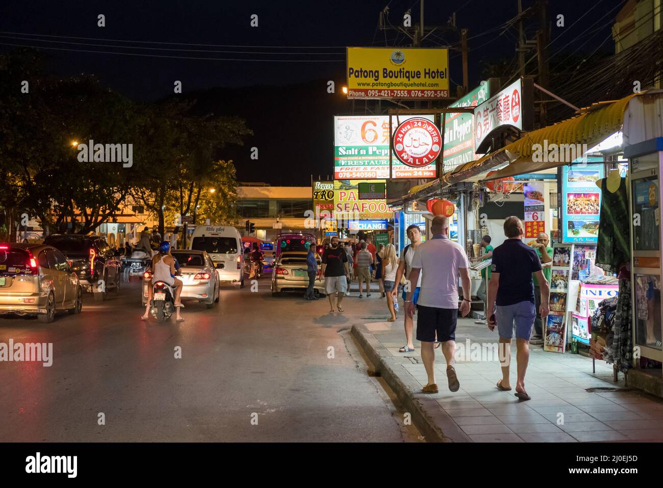 Thawewong Road in Patong by night. This road along Patong beach is very ...