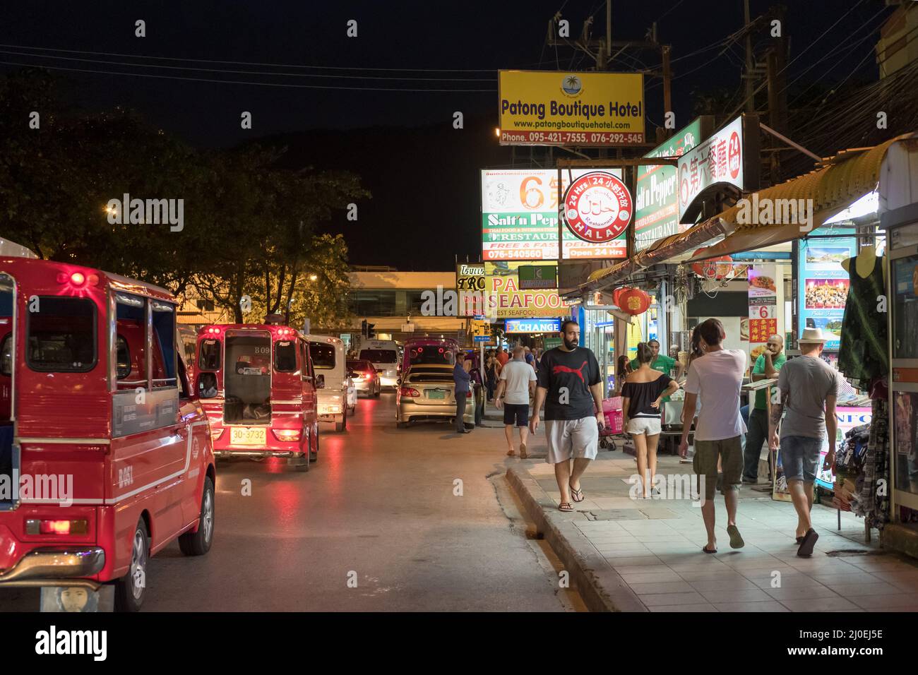 Thawewong Road in Patong by night. This road along Patong beach is very ...