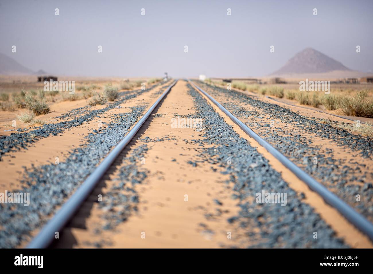 Railway line for iron ore trains in the Sahara desert near Choum ...