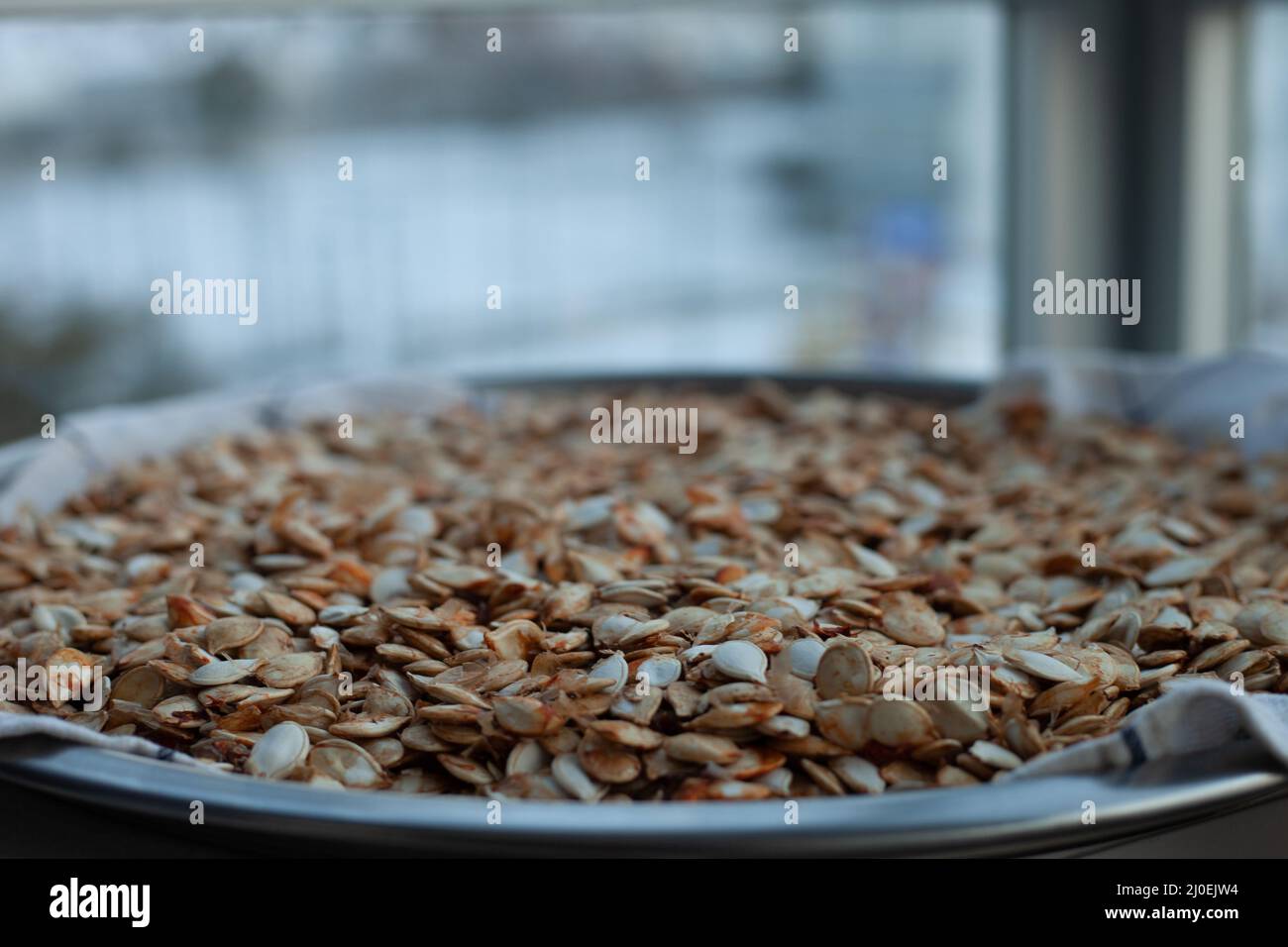homemade pumpkin seeds drying process Stock Photo - Alamy