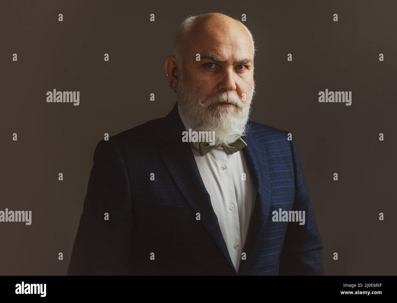 Serious Senior. Middle aged man. Grandfather, grandpa Stock Photo - Alamy