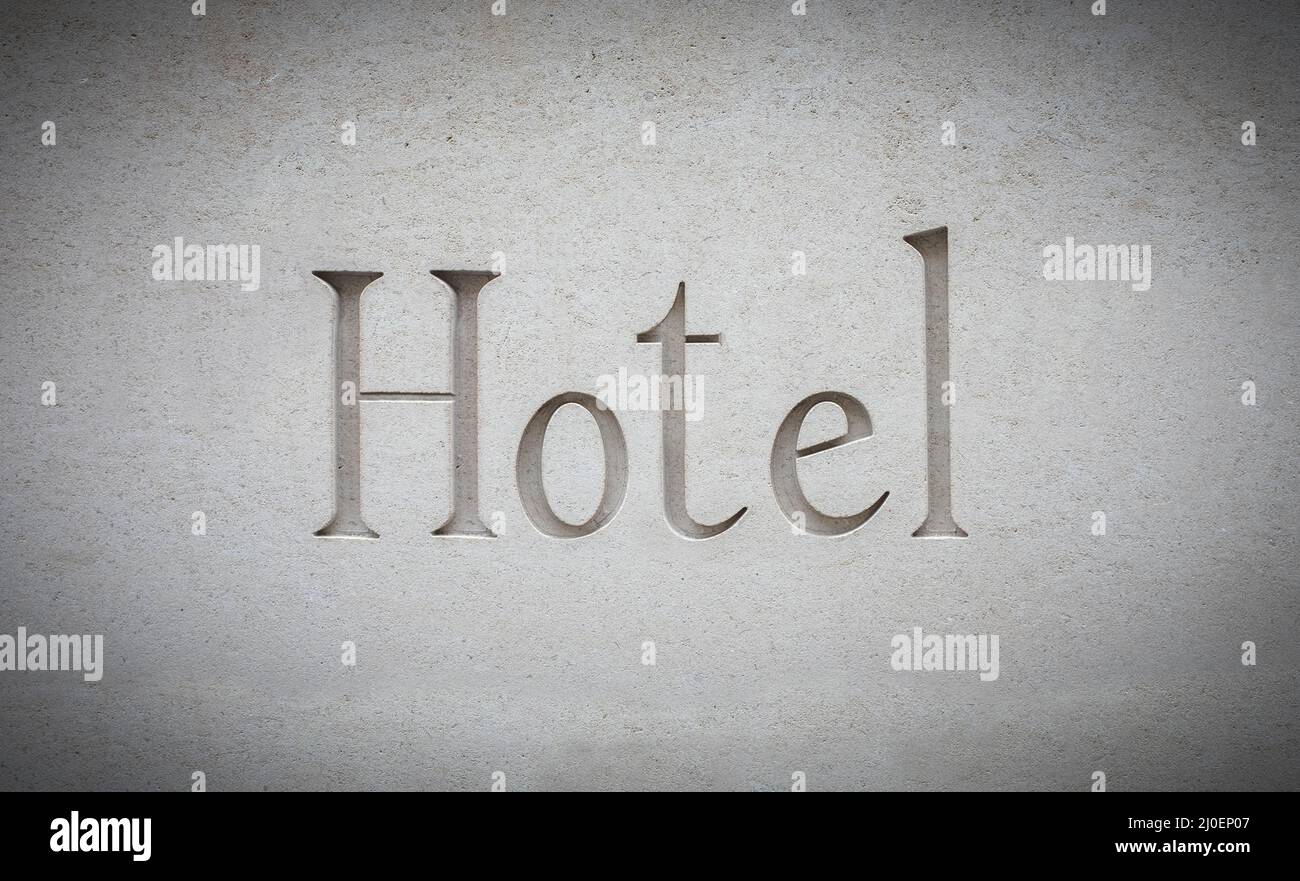 Luxury Hotel Sign Engraved In Stone Stock Photo - Alamy