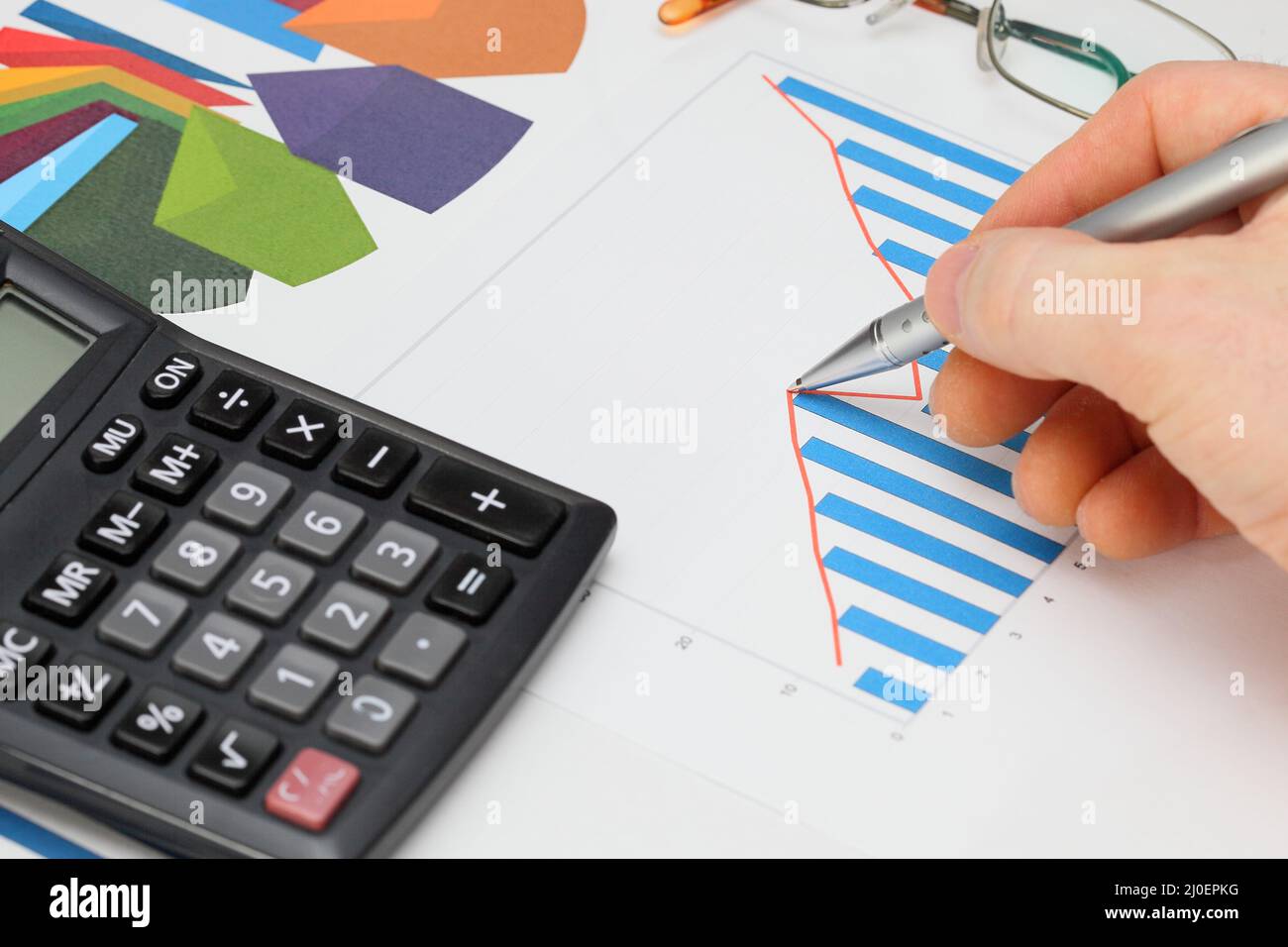 Calculator and chart symbol Stock Photo - Alamy