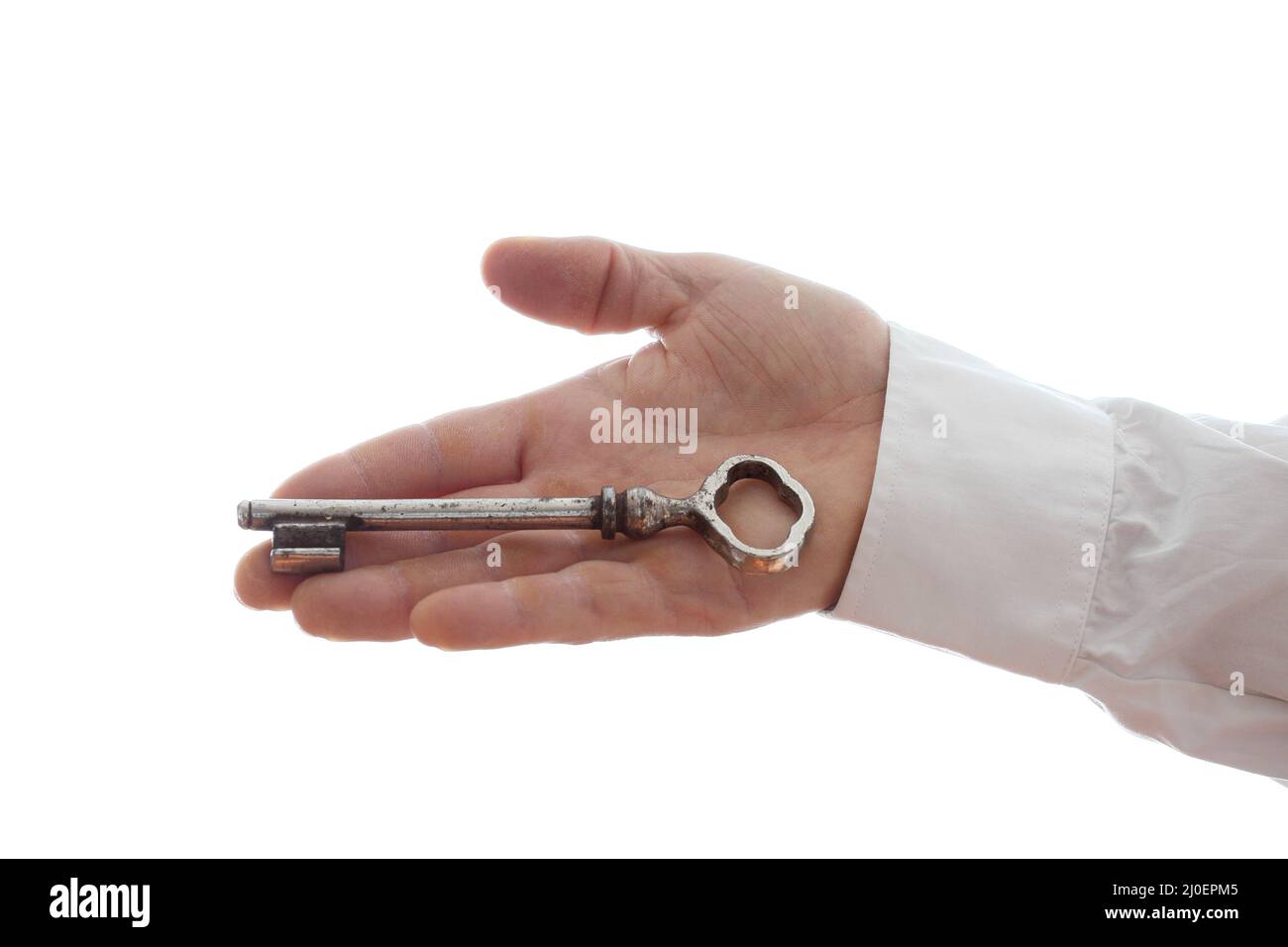 Hand with key Stock Photo - Alamy