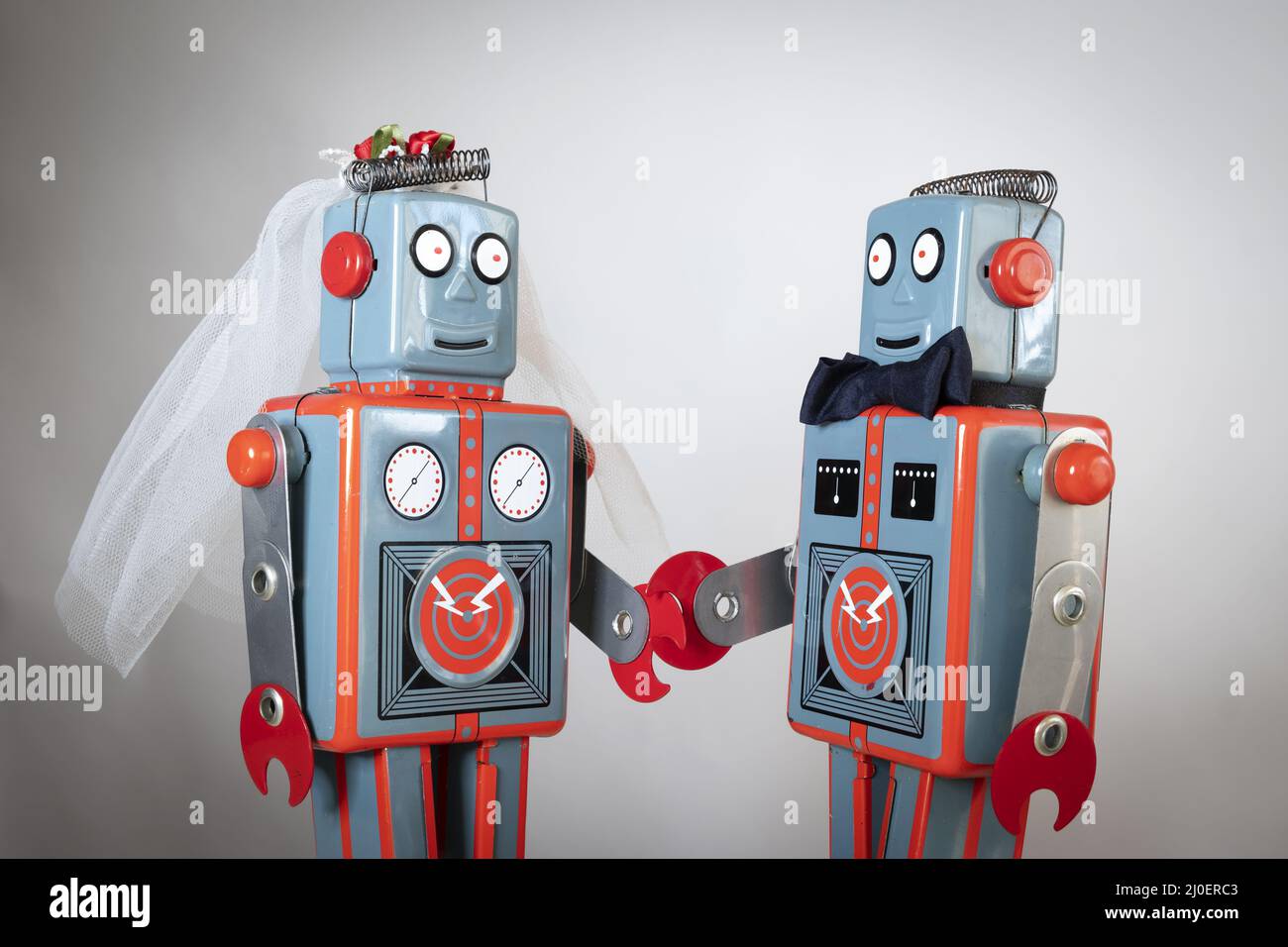 Two robots getting married Stock Photo - Alamy