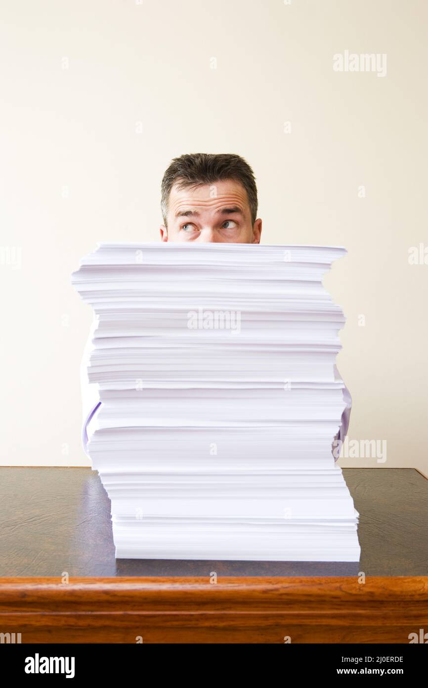 Man office paperwork behind hi-res stock photography and images - Alamy