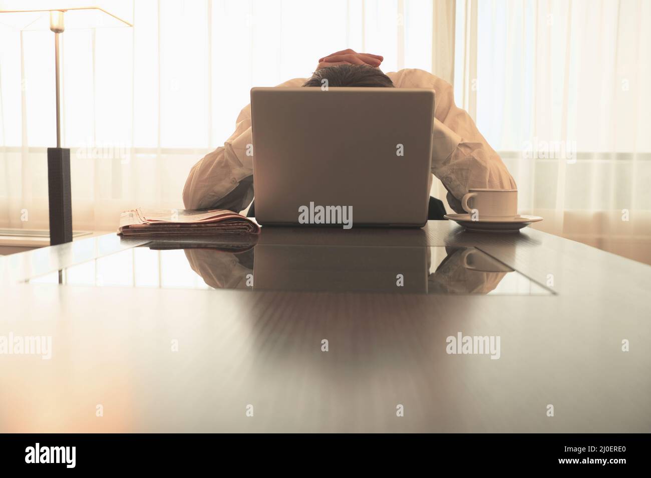 Businessman behind computer hi-res stock photography and images - Alamy