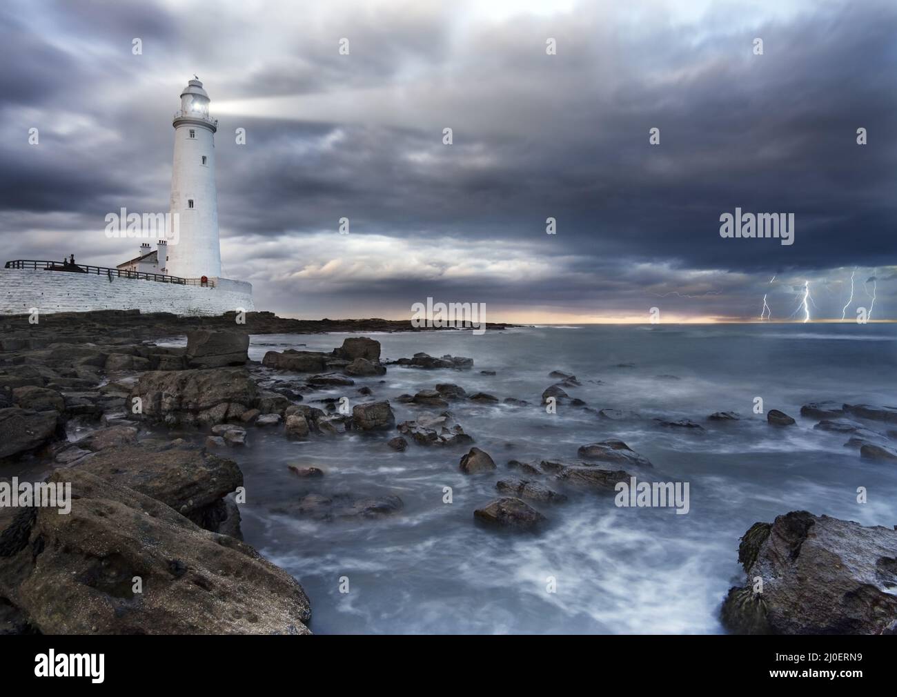 A view of a lighthouse a storm Stock Photo - Alamy