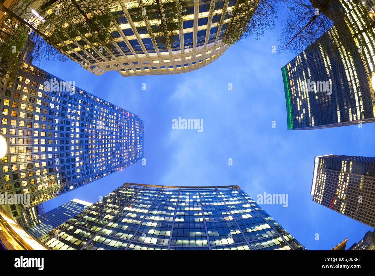 Low angle of office buildings at dusk Stock Photo - Alamy