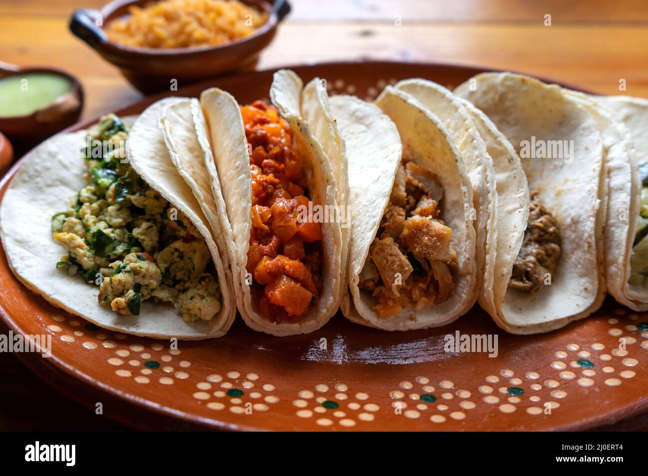 Traditional mexican stew tacos "guisados Stock Photo - Alamy