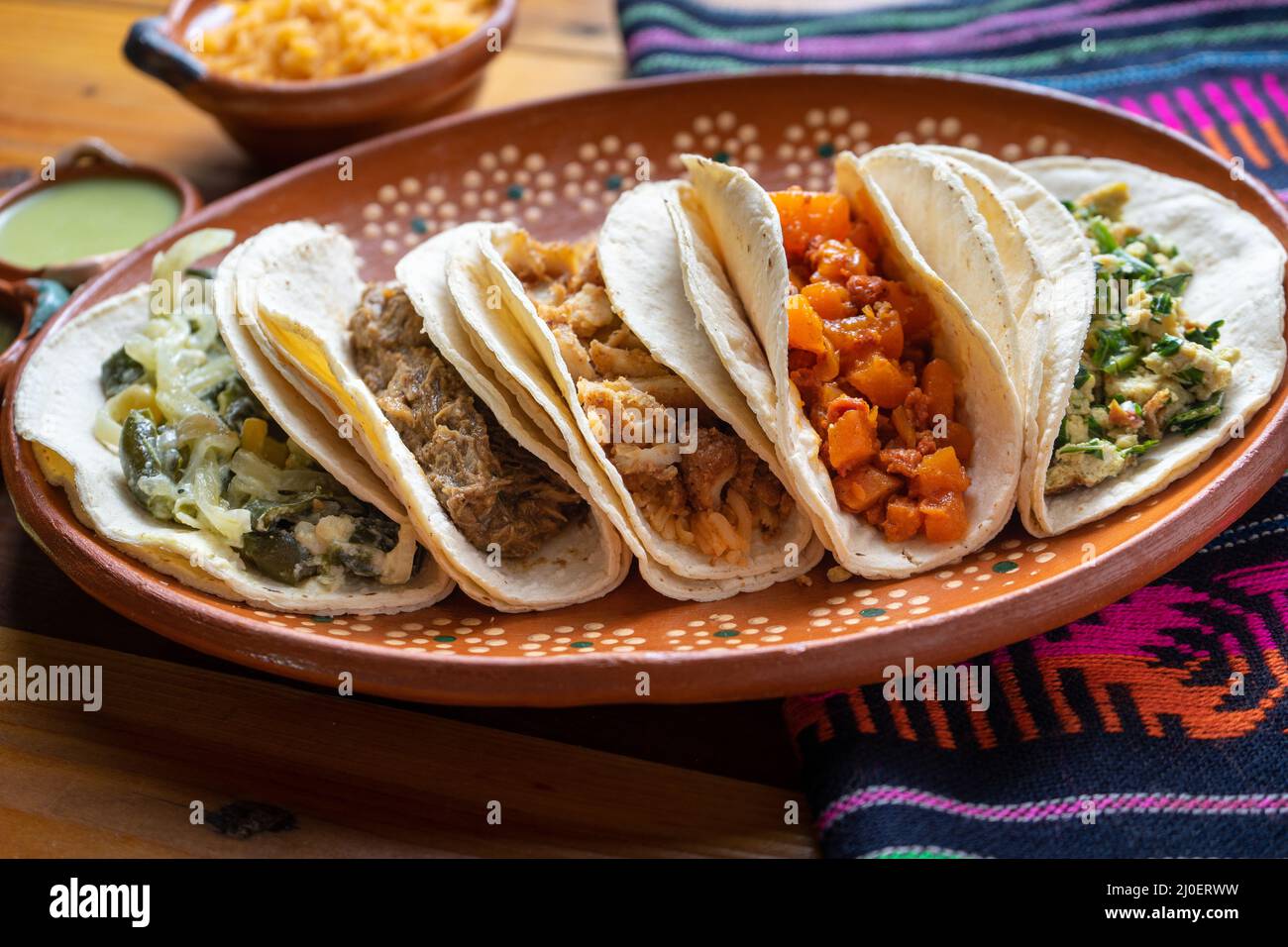 Traditional mexican stew tacos "guisados Stock Photo - Alamy