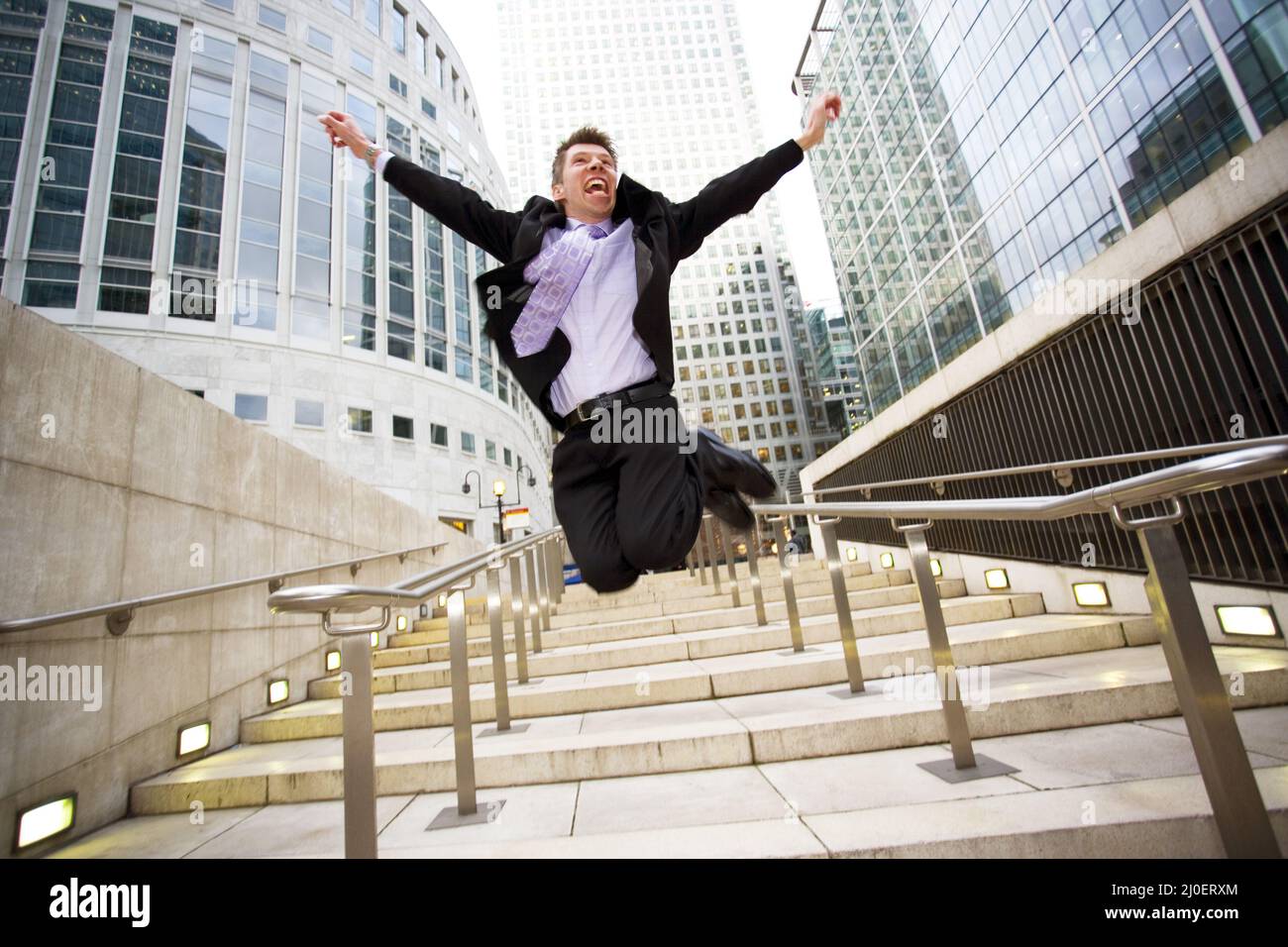 Joyful crazy businessman jumping hi-res stock photography and images ...