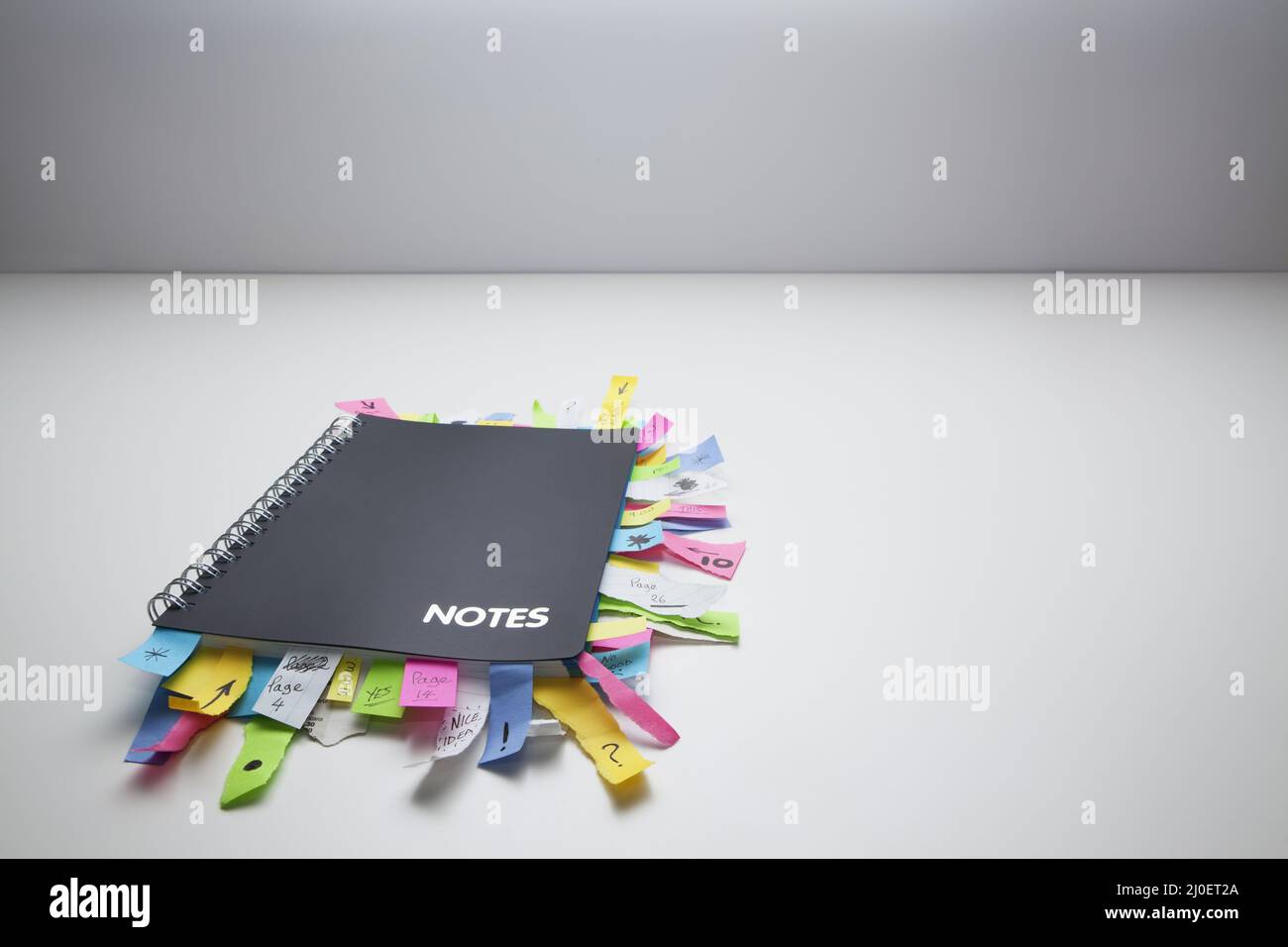 A note pad full of sticky notes Stock Photo - Alamy