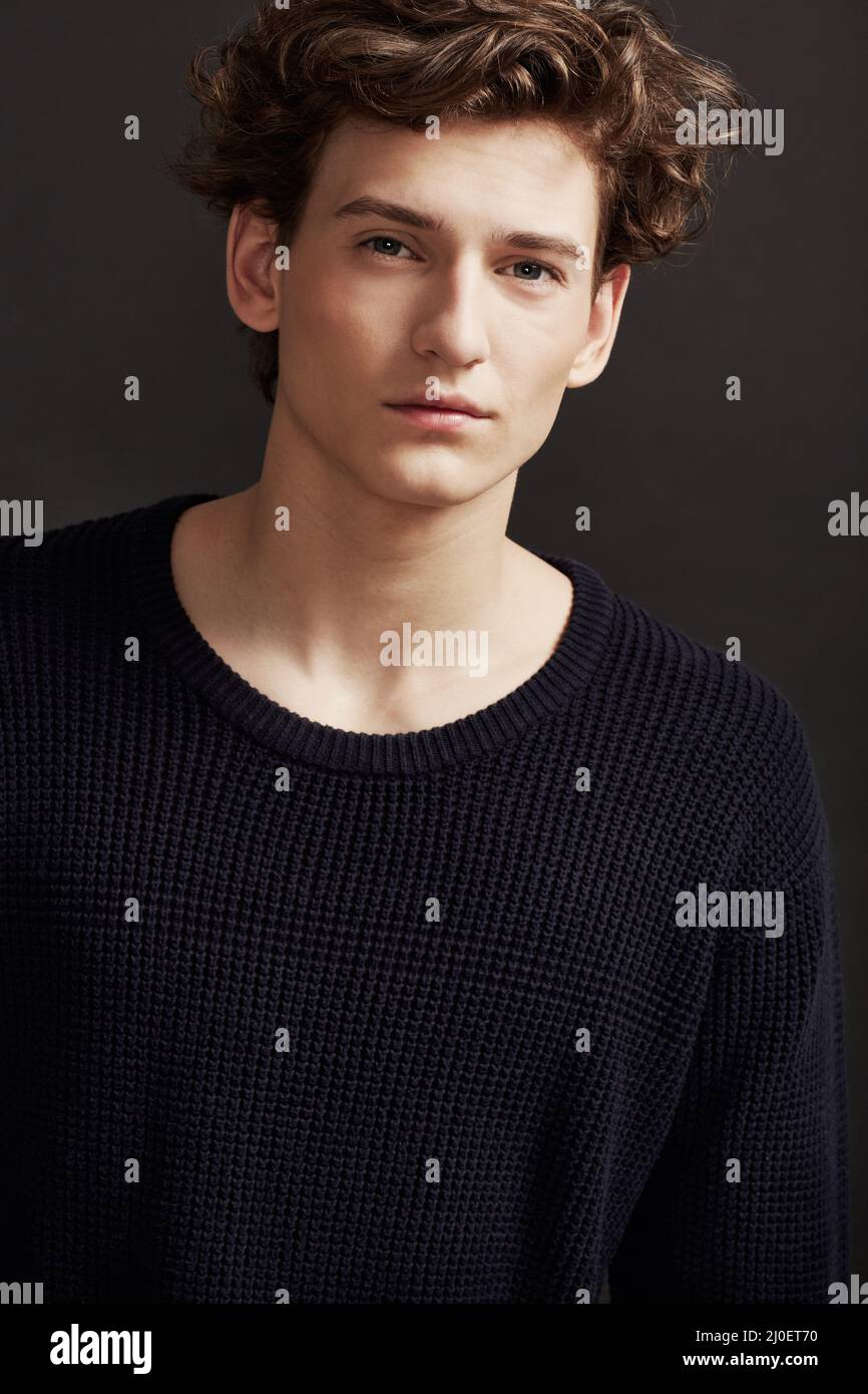 Wise beyond his years. Portrait of a fresh-faced young man wearing ...