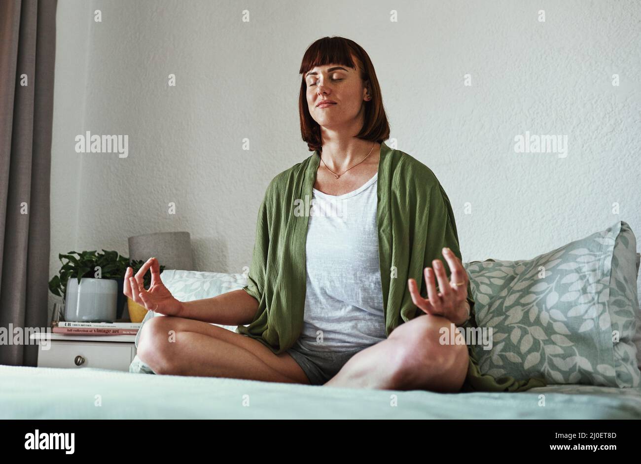 One young woman meditation sitting hi-res stock photography and images ...