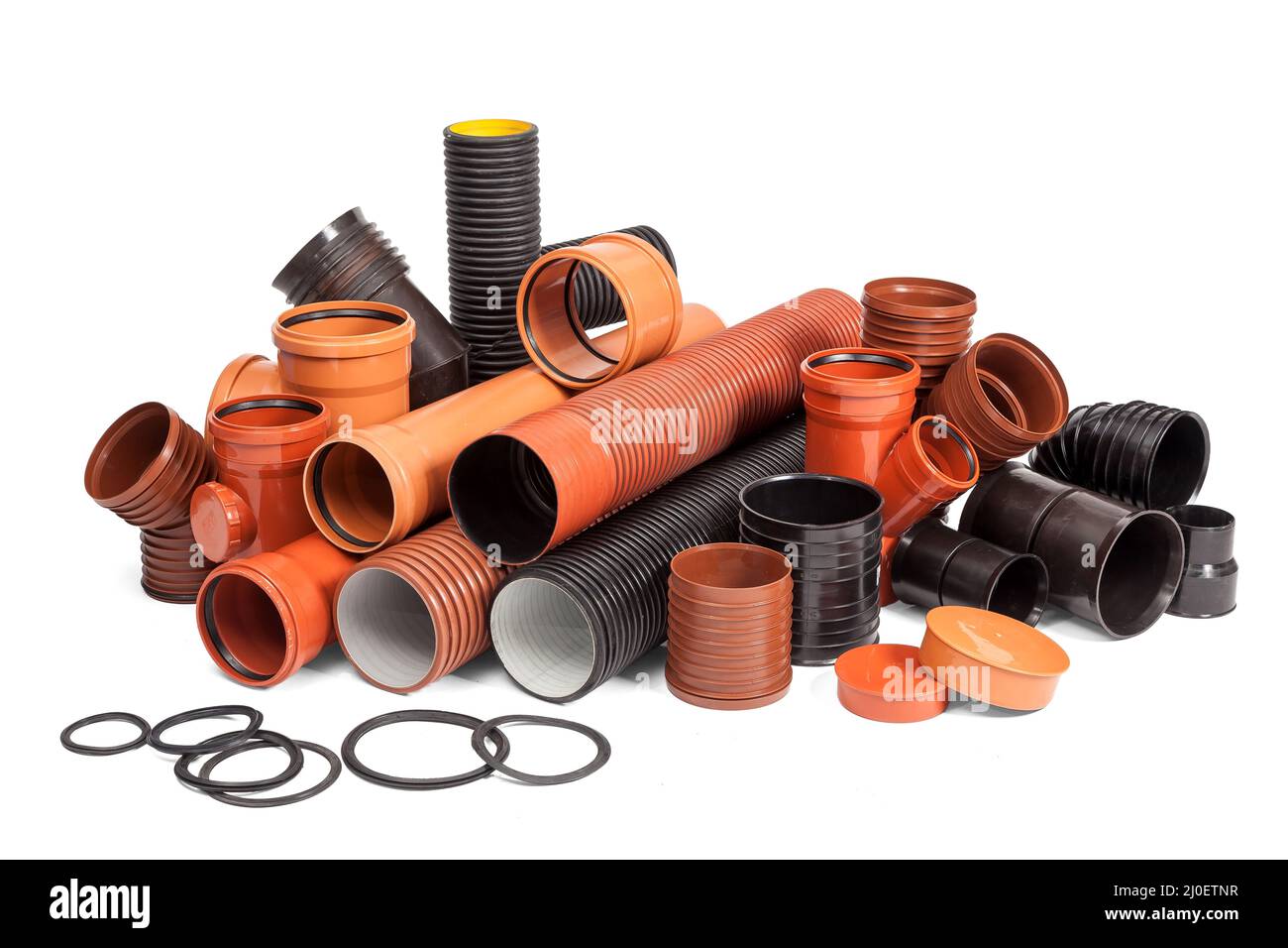 Assorted PCV sewage parts shot over white background Stock Photo - Alamy