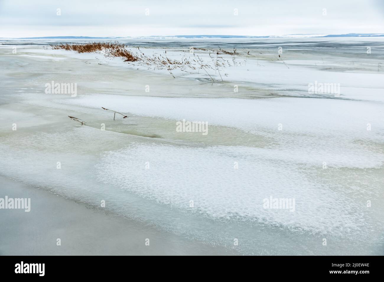 Ice crust on the river Stock Photo - Alamy