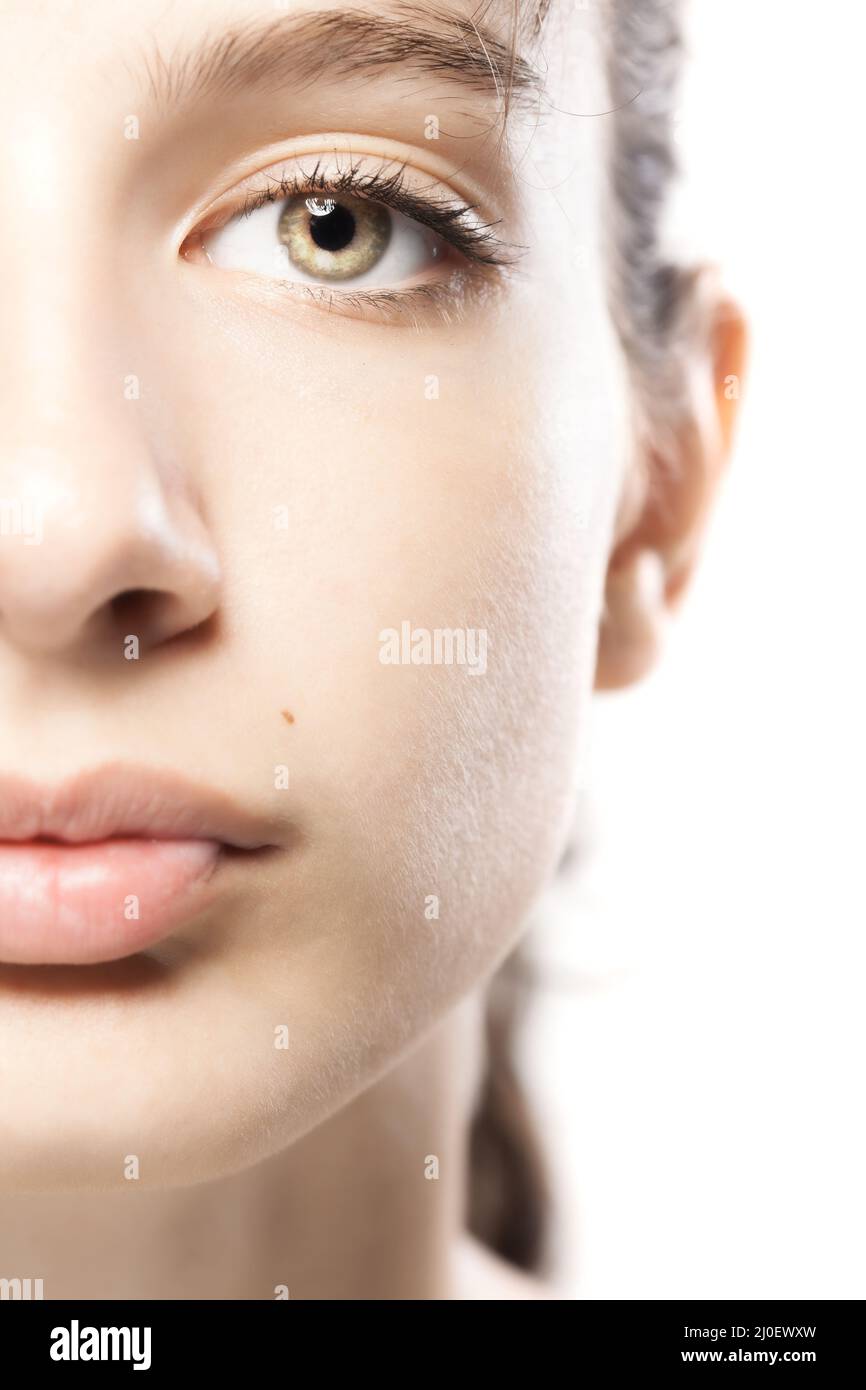 Beautiful young girl studio portrait. Abstract eyes looking at camera ...