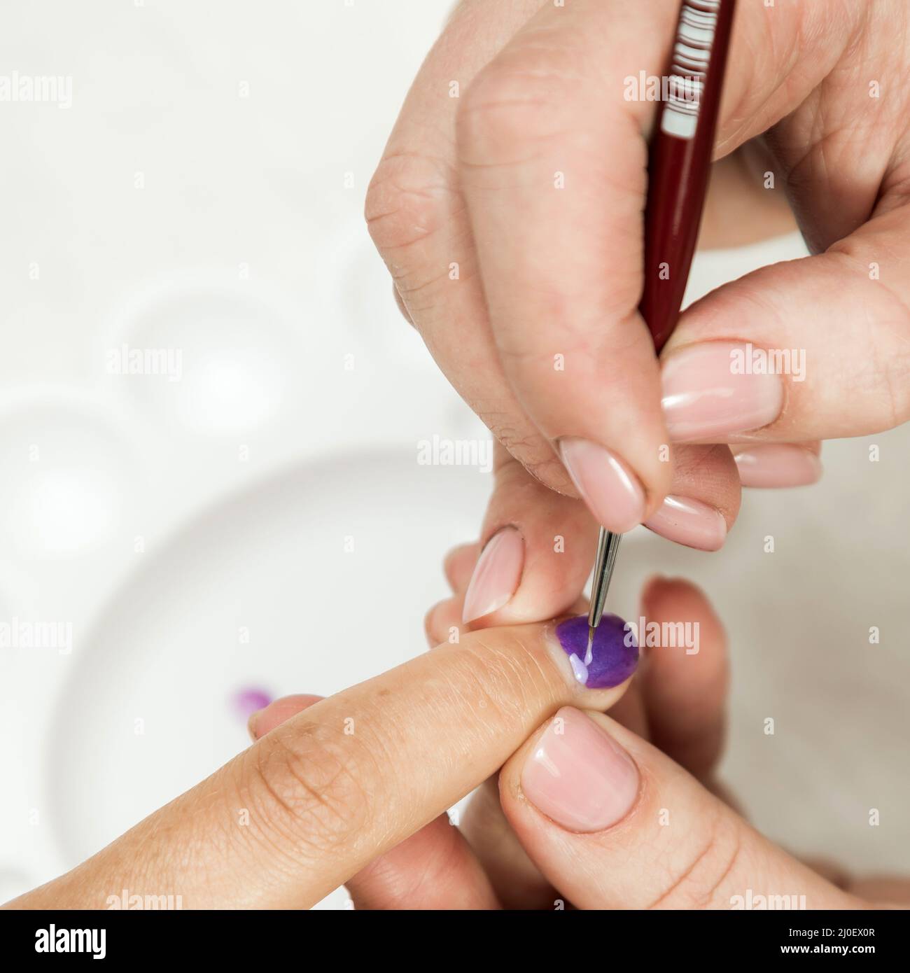 Manicure process in beauty salon, close up Stock Photo - Alamy