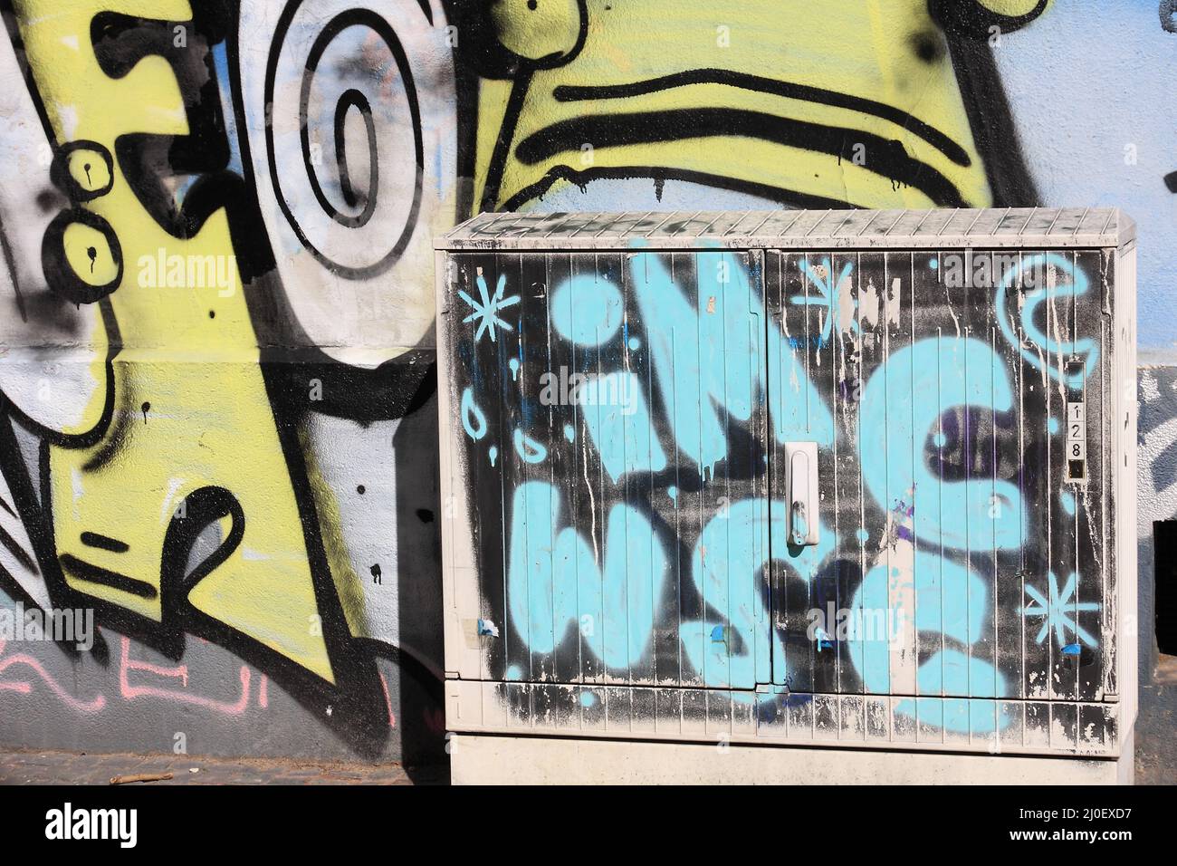 Graffiti on house wall and electricity box Stock Photo - Alamy