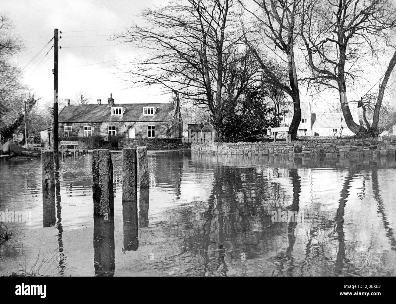 The centre of Ovingham, flooded after heavy overnight rain had forced ...