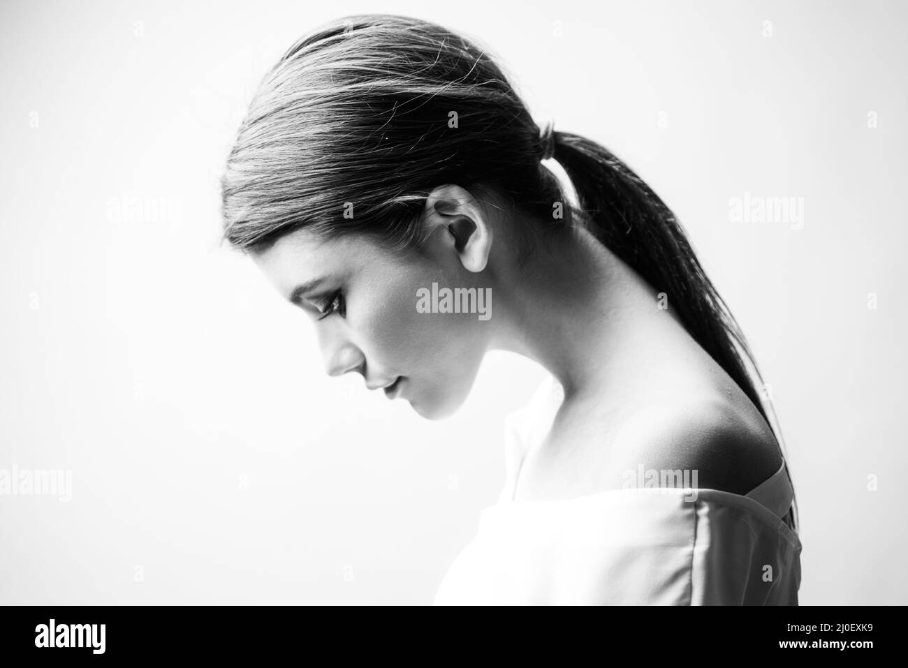 Thinking woman looking down. Problems solution. Overthinking girl Stock ...