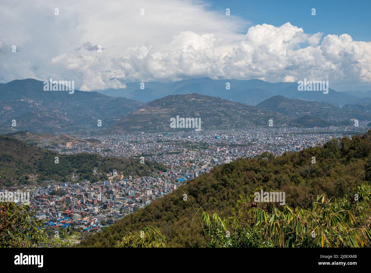 The cityscape of Pokhara with the Annapurna mountain range covered in ...