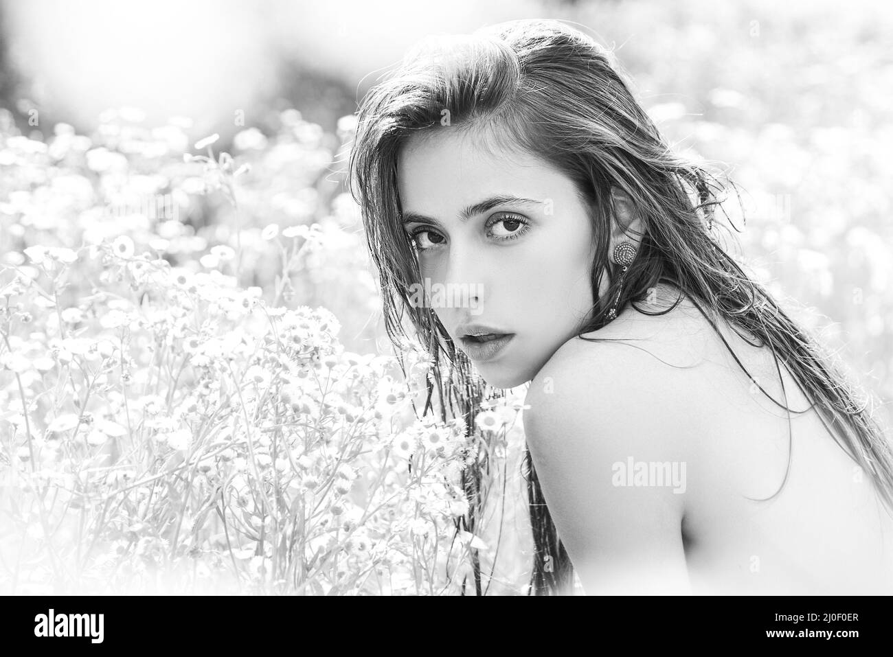 Spring young woman outdoors. Beautiful carefree girl in fields. Natural ...