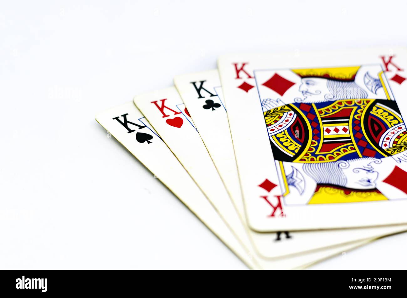 Playing cards depicting the four kings isolated on a white background ...