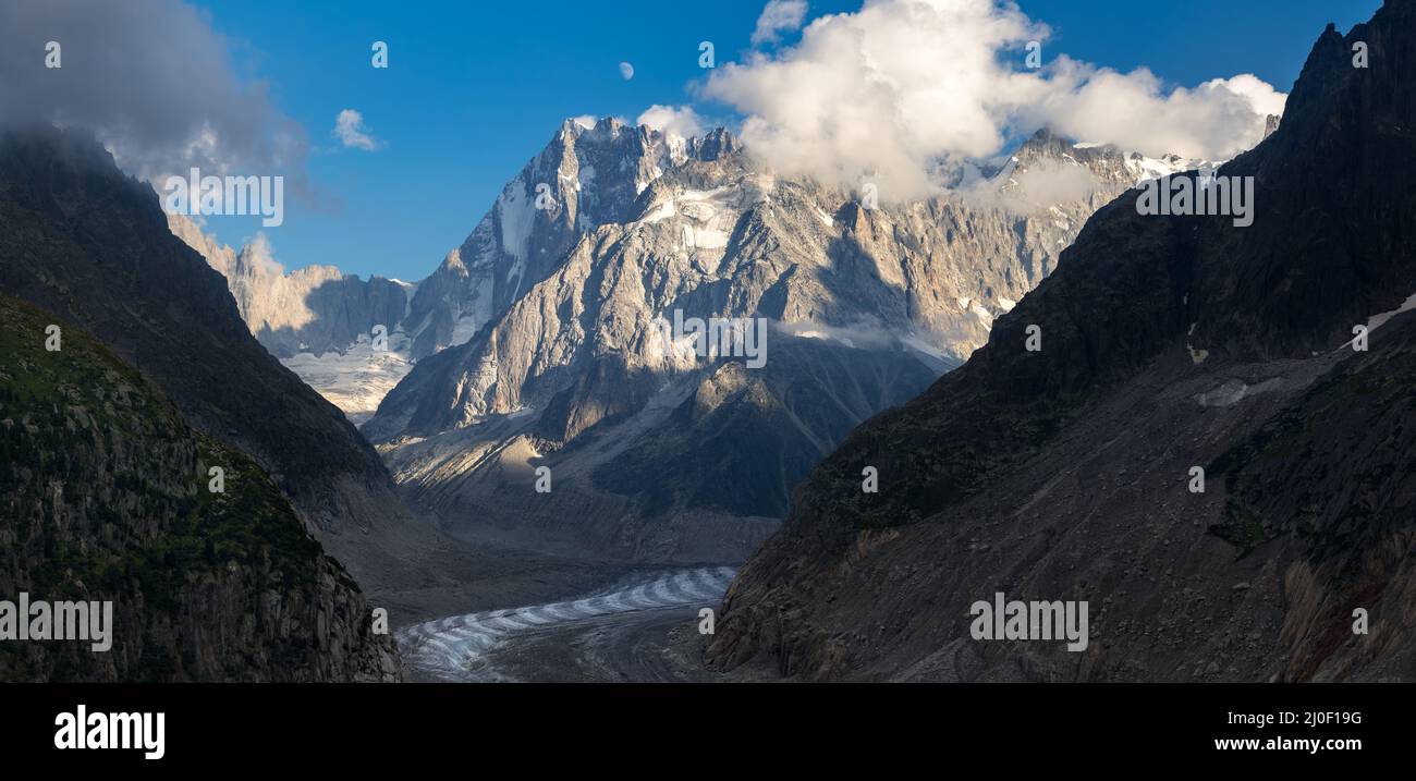 Moon rise on Les Grandes Jorasses and the Mer de Glace glacier. View of ...