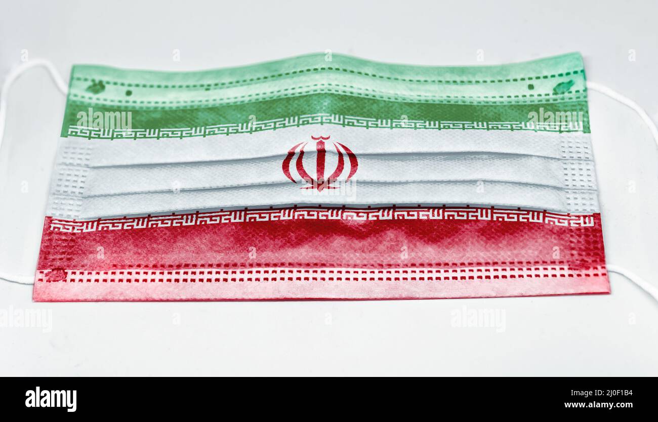 Surgical mask with the national flag of Iran printed Stock Photo - Alamy