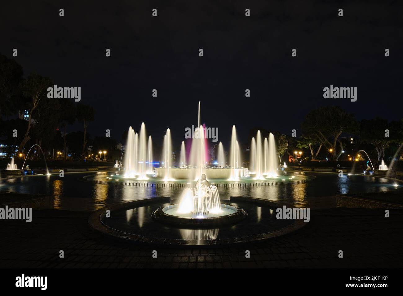 Night scene of waterfalls in the pools of the magic water circuit in ...