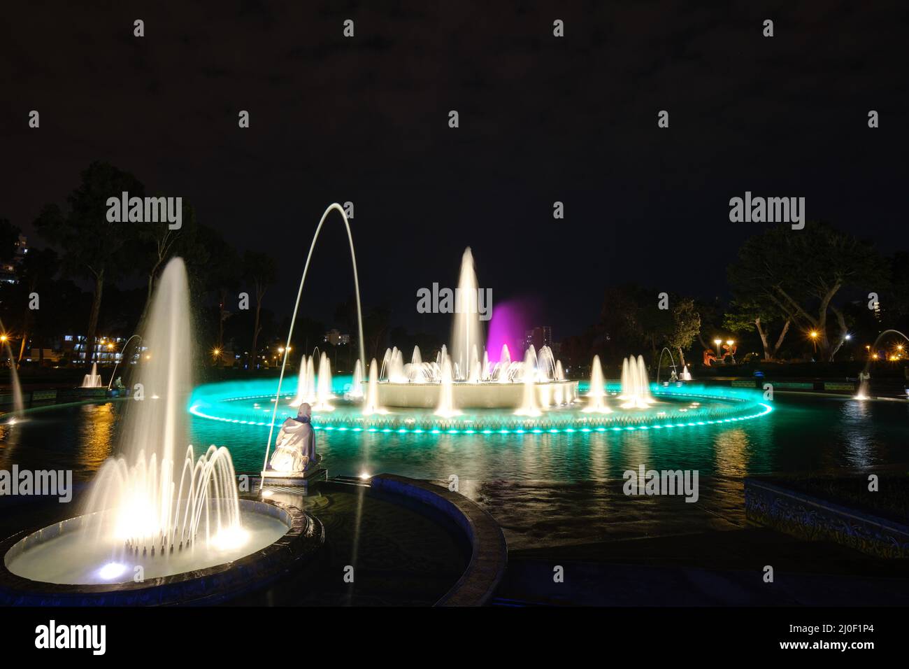 Night scene of waterfalls in the pools of the magic water circuit in ...