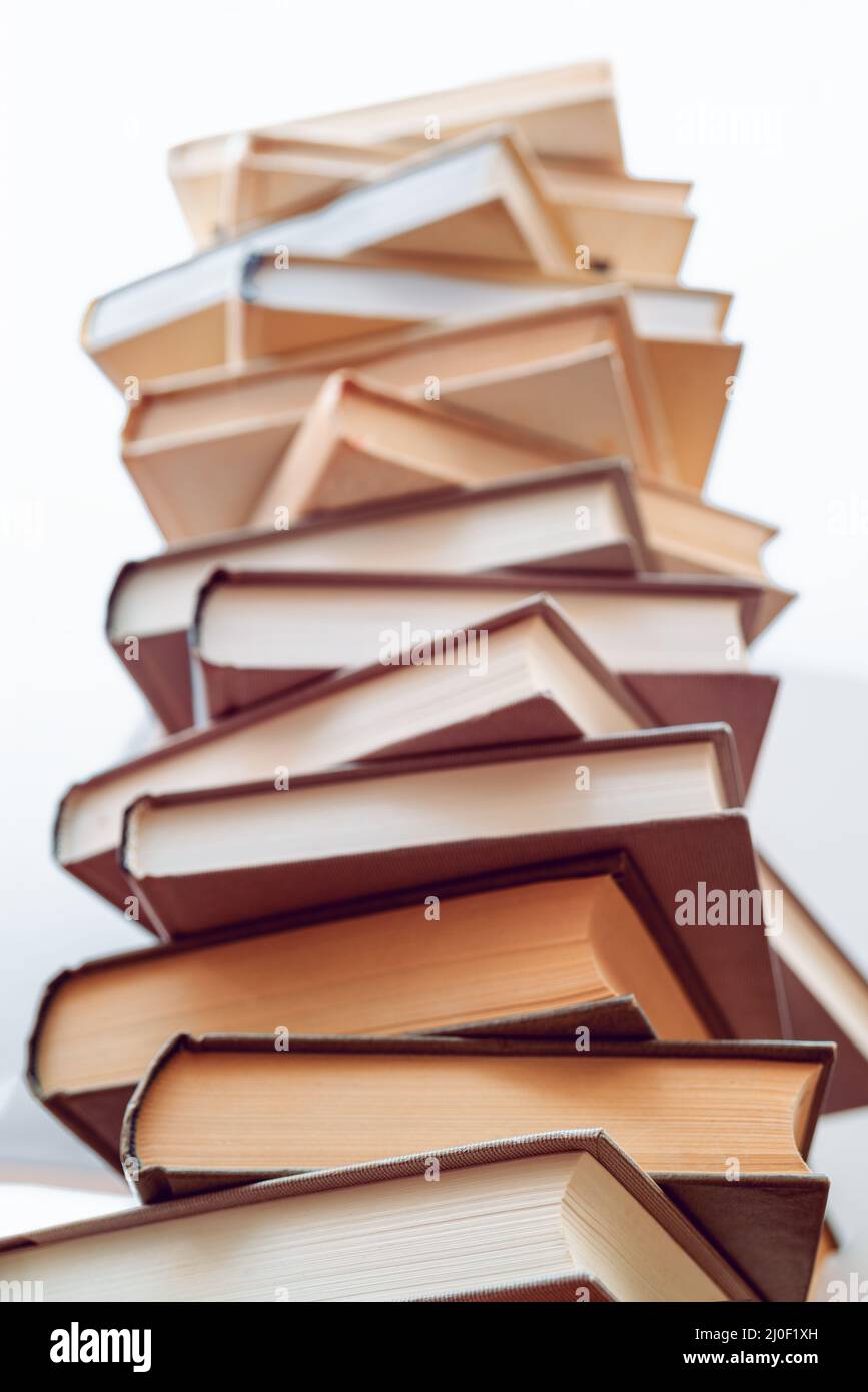 Stack of books in library. Scientific, educational, and fiction paper ...