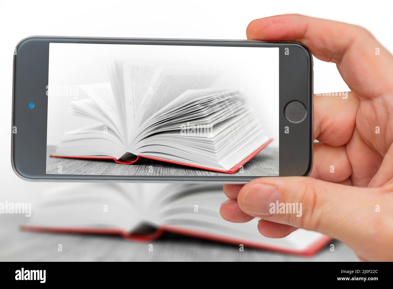 Book on smartphone screen. Big open book. Pages of new book. Training ...