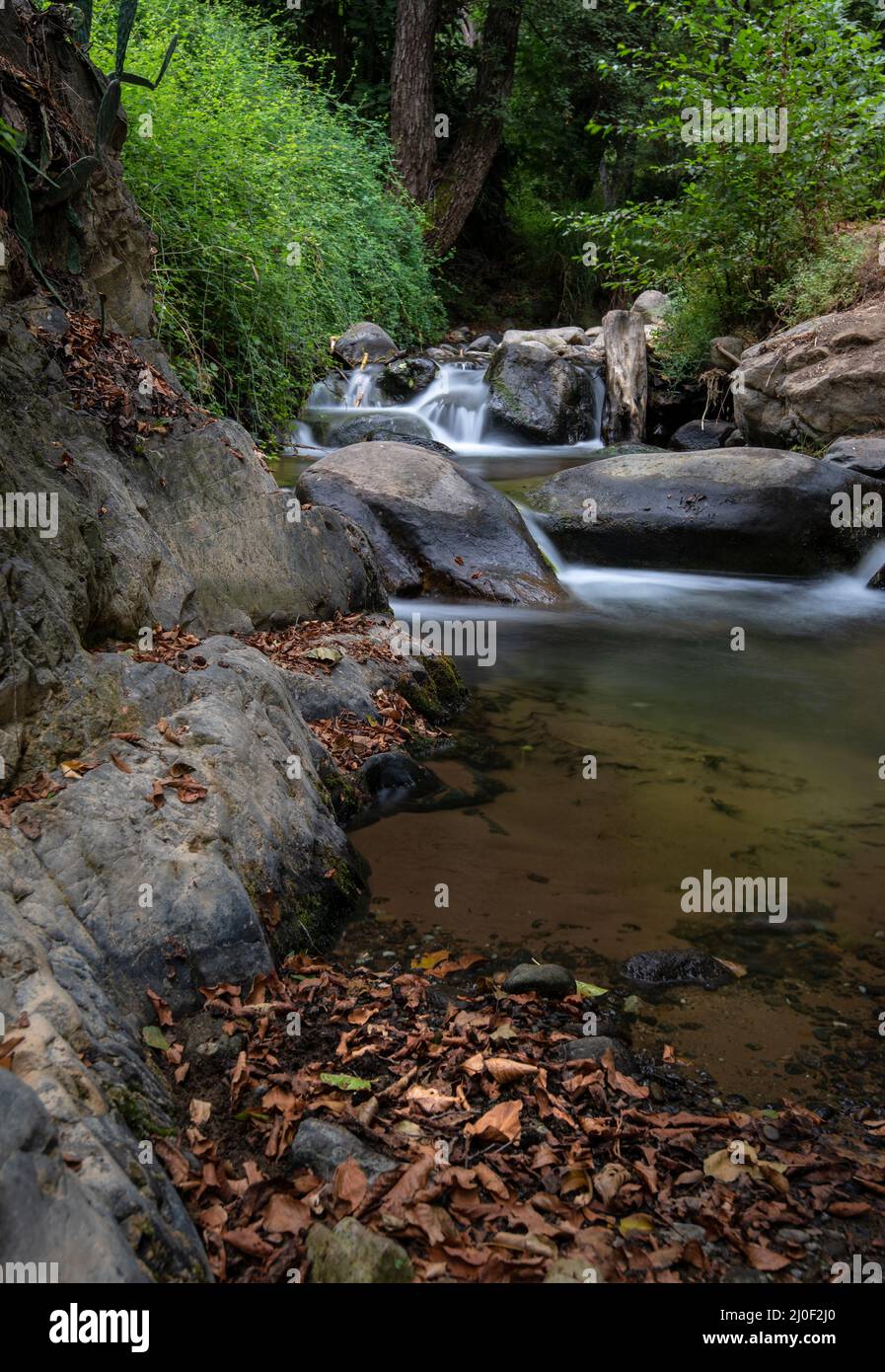 Water stream on the river with small waterfalls, Kakopetria, Cyprus ...