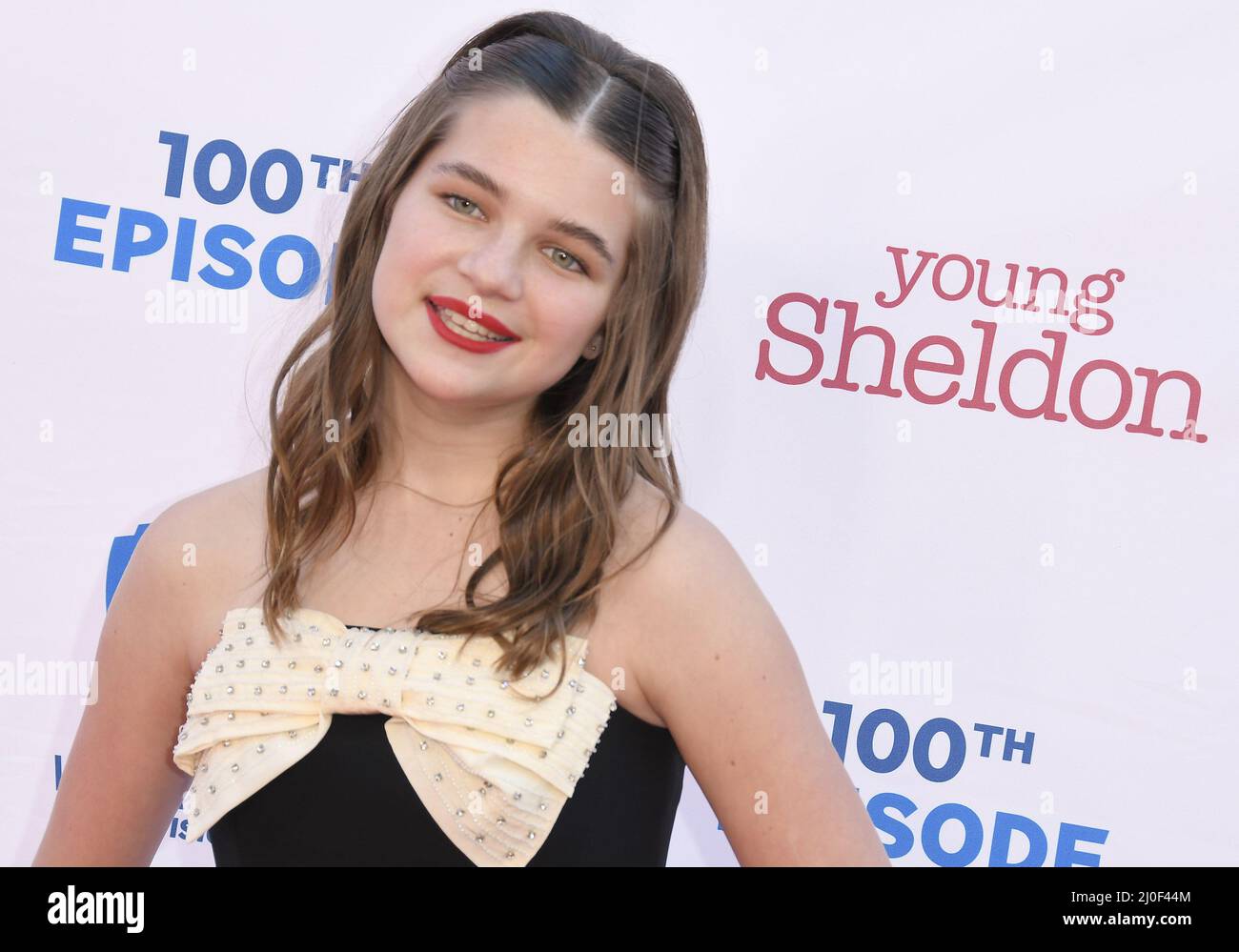 Raegan Revord arrives at the Premiere Of Warner Bros. 100th Episode Of ...