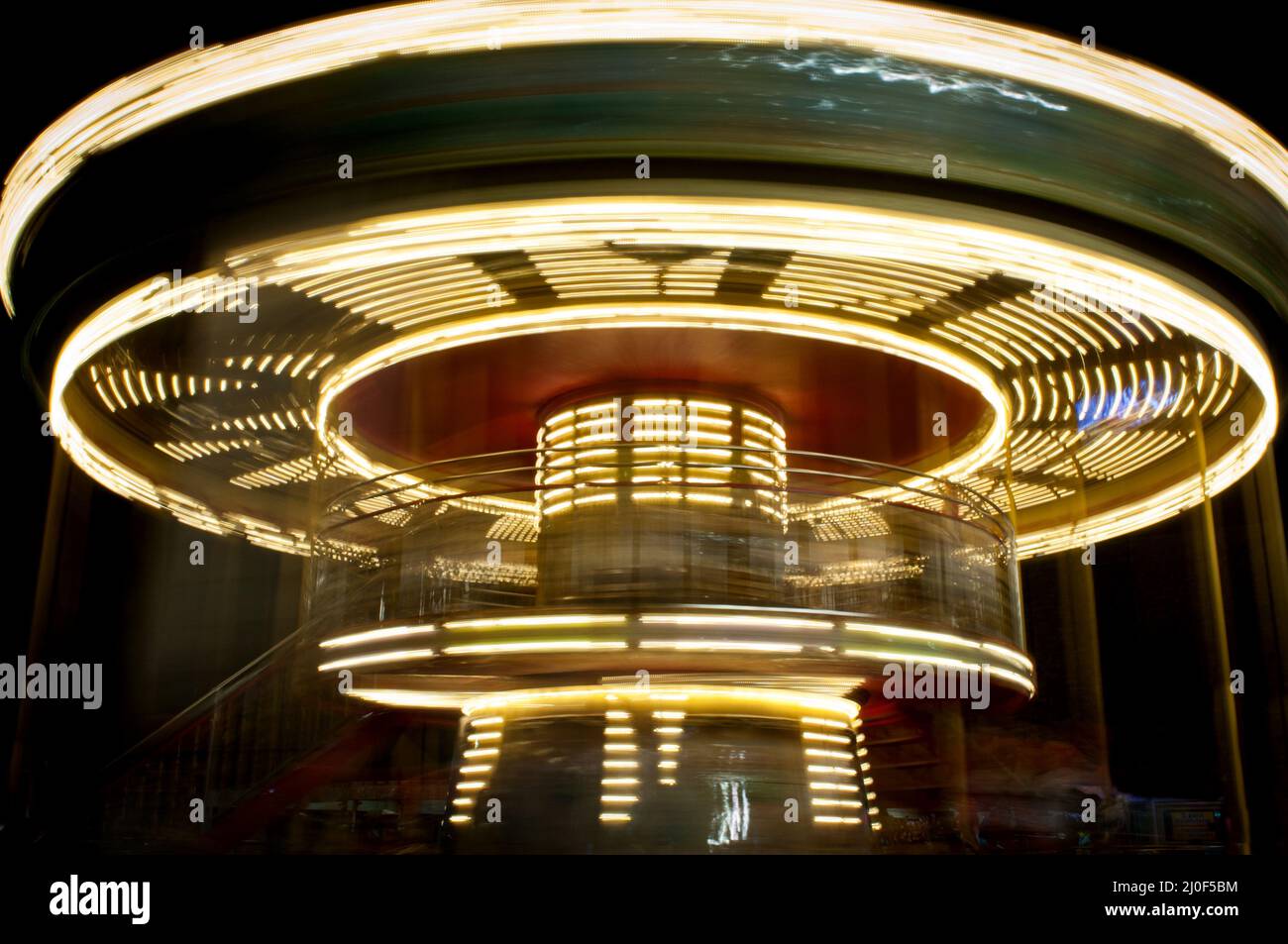 Merry go round, Carousel park game spinning around Stock Photo - Alamy