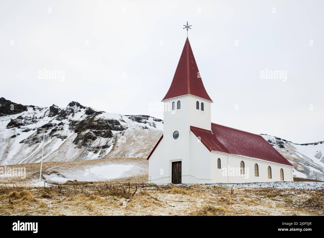 The Vik I Myrdal church at the top of the hill at the village of vik in ...