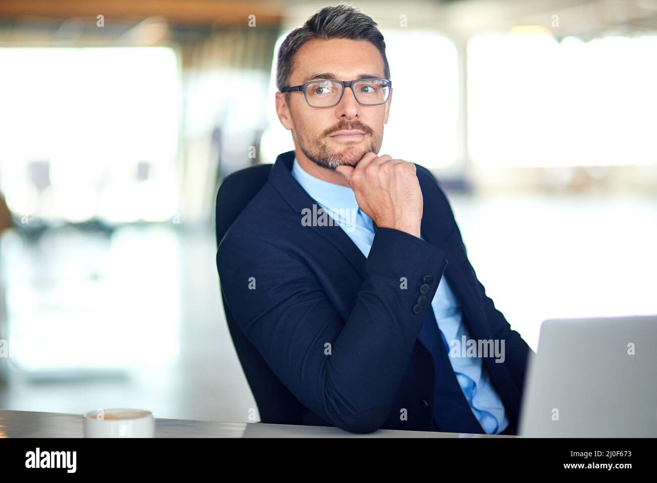 Businessman considering options hi-res stock photography and images - Alamy