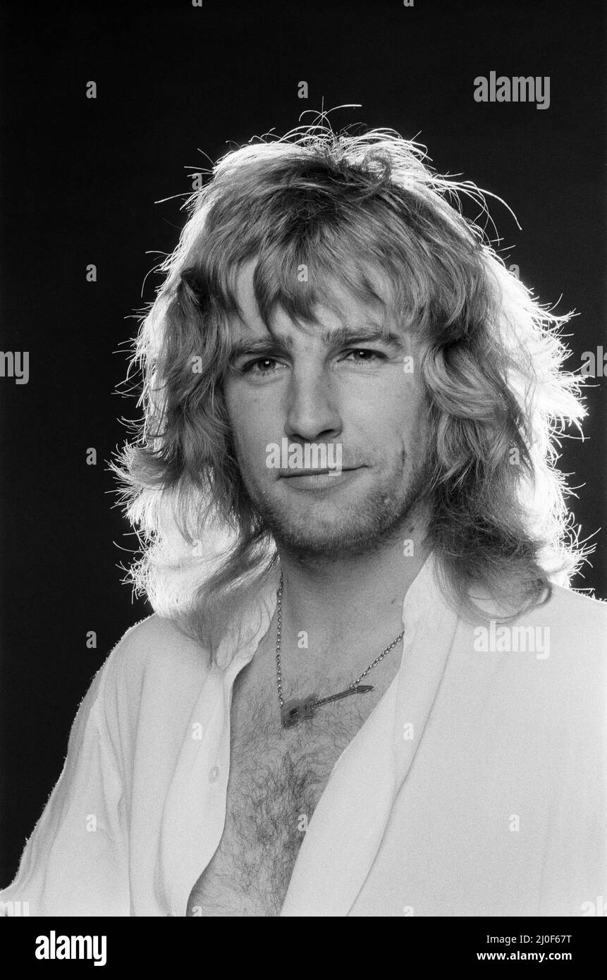 Rick Parfitt, rhythm guitarist, singer and songwriter in the rock band ...